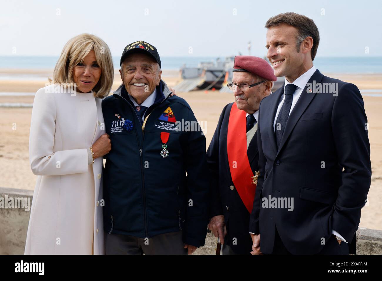 France's President Emmanuel Macron (R), French President's wife ...