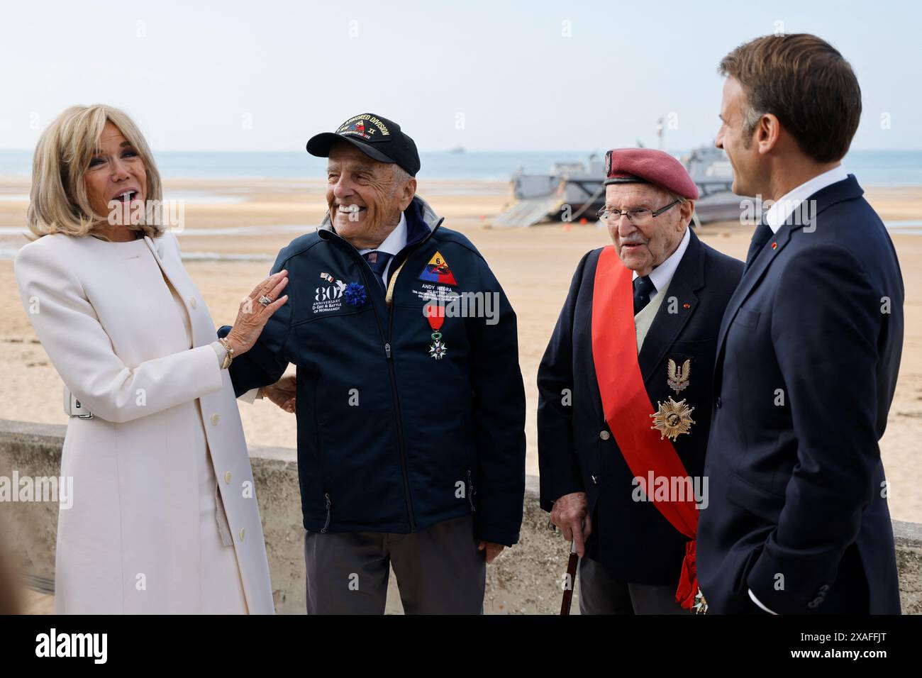 France's President Emmanuel Macron (R), French President's wife ...