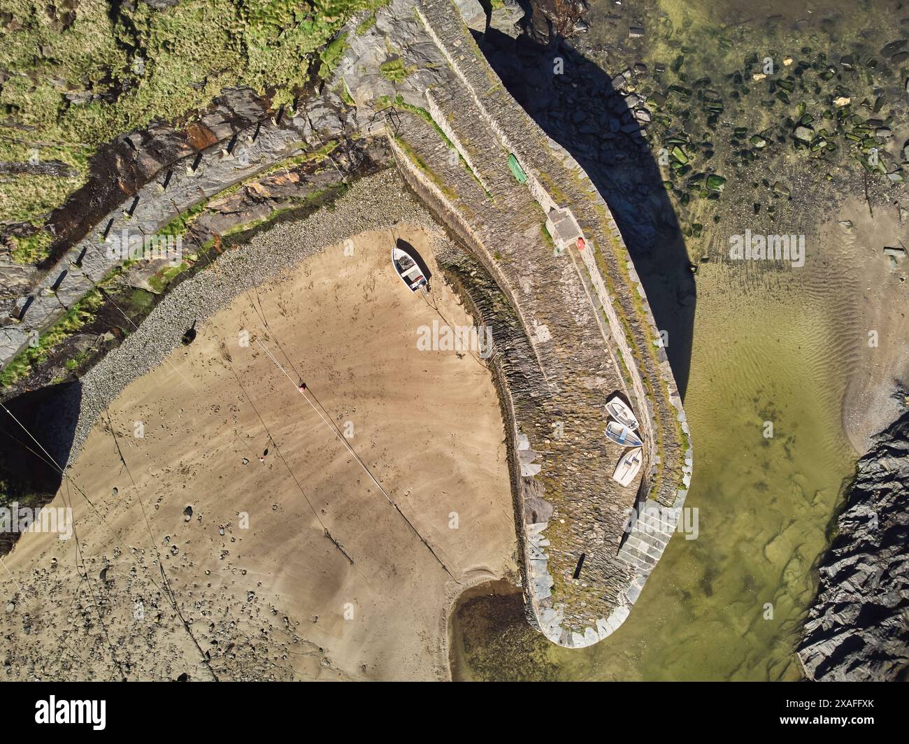 An aerial view, looking straight downwards, of the quay at Boscastle ...