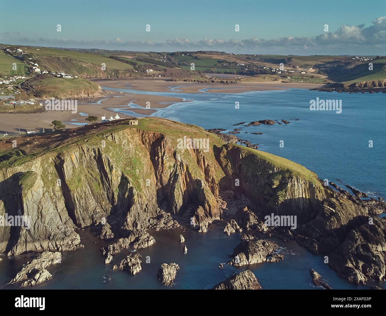 An aerial view of cliffs of Burgh Island, Bigbury, looking over Bigbury ...