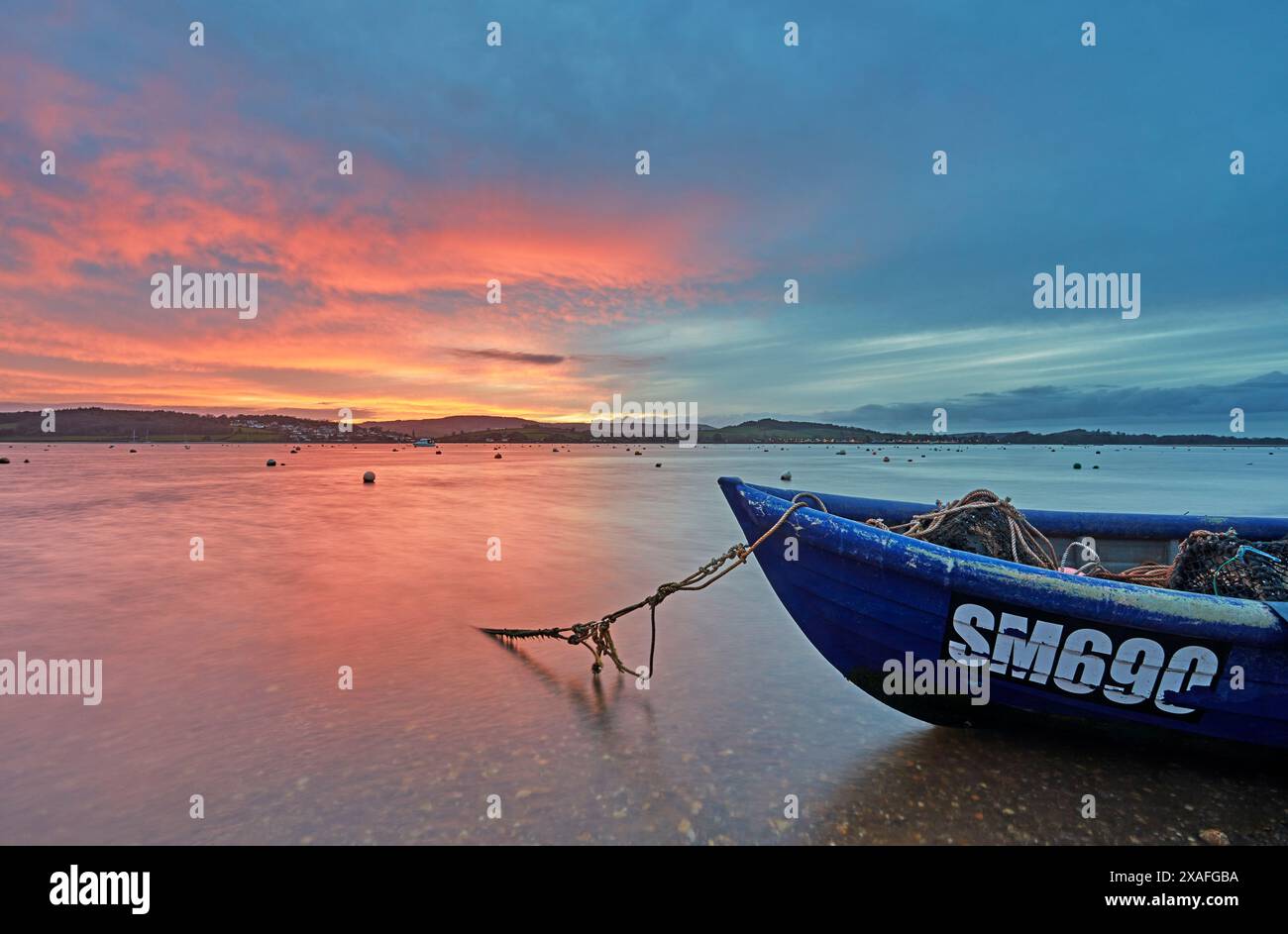 A calm dusk view over the estuary of the River Exe, at Exmouth, Devon ...