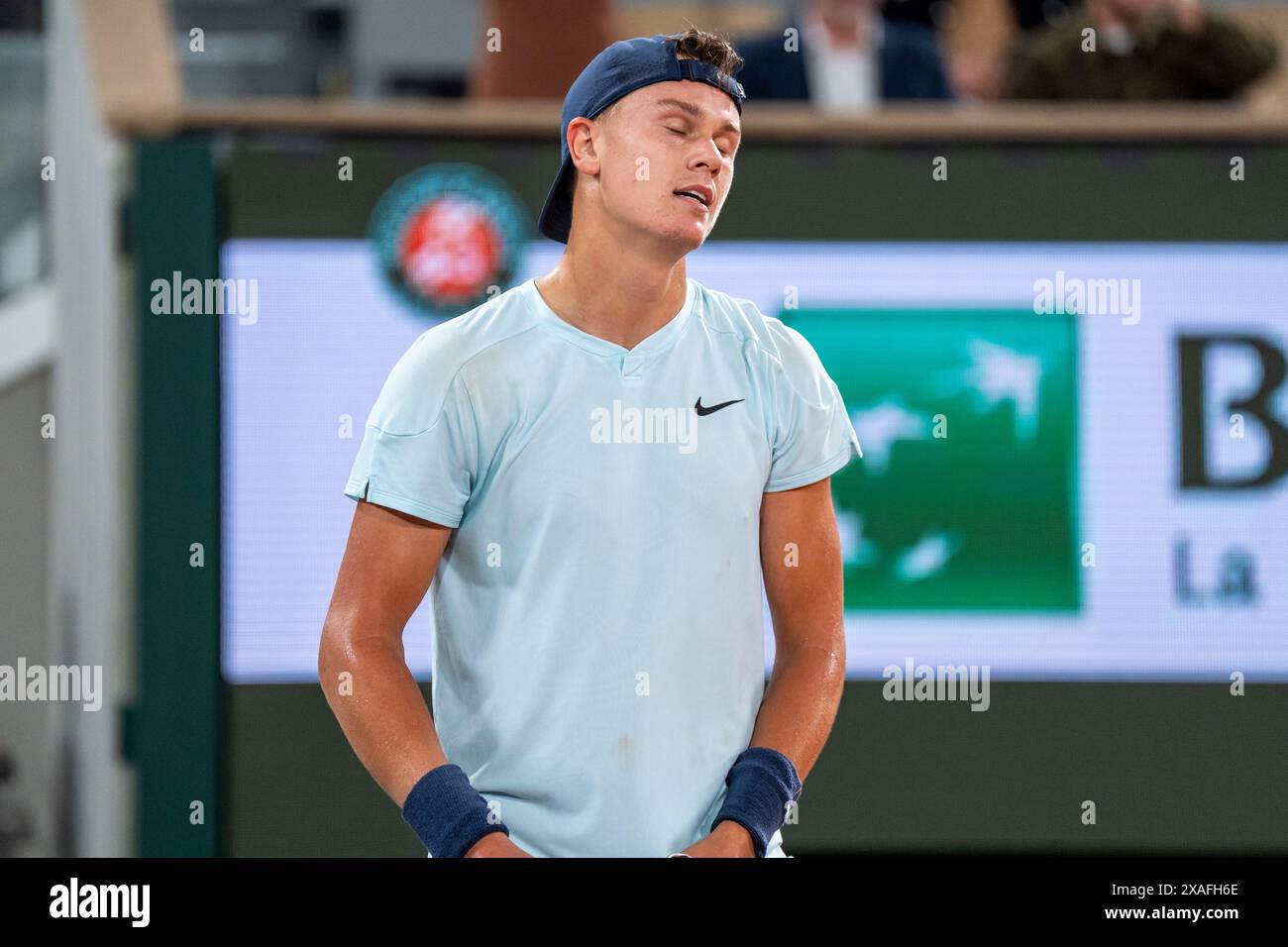 PARIS, FRANCE - JUNE 4: Holger Rune of Denmark looks dejected during ...