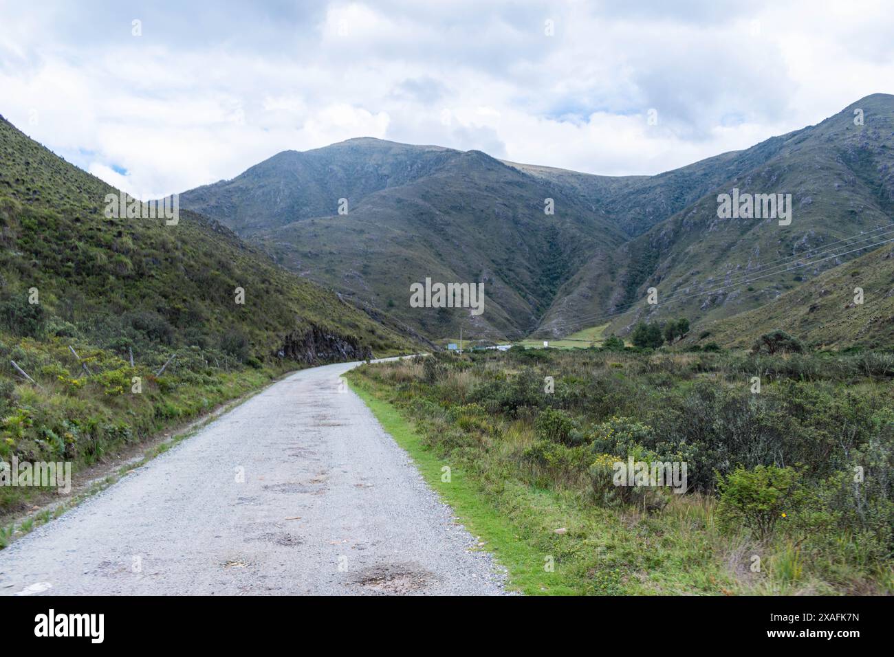 mountainous landscape with an unpaved road in the cold mountains of ...