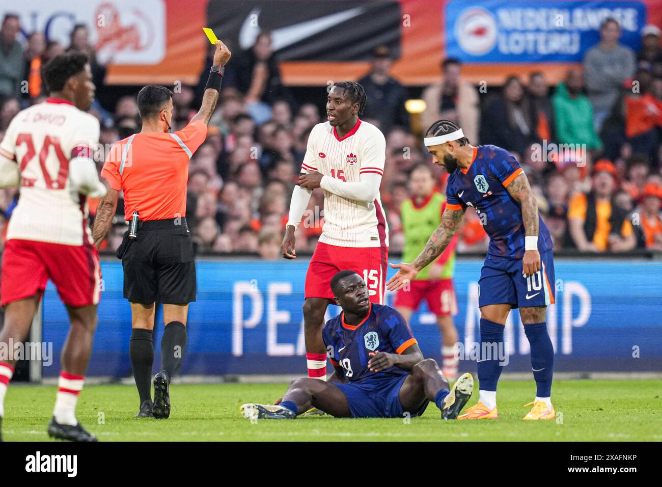 ROTTERDAM, NETHERLANDS - JUNE 6: Moise Bombito of Canada receives a ...