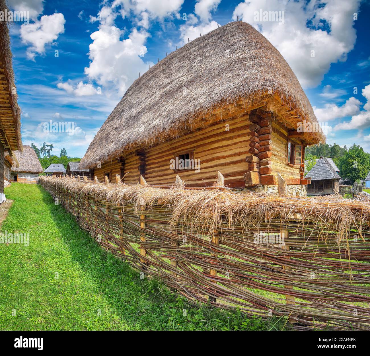 Amazing summer scene of traditional romanian peasant houses. Beauty of ...