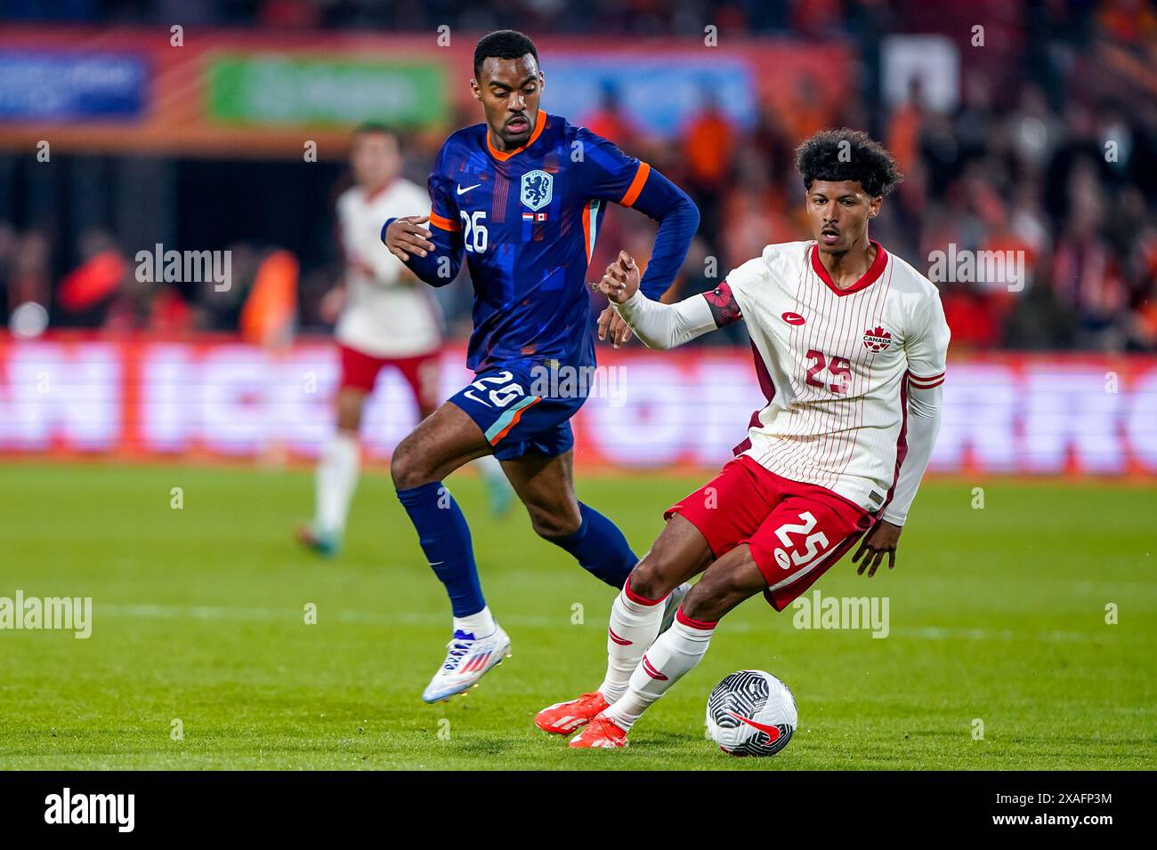 ROTTERDAM, NETHERLANDS - JUNE 6: Charles Brym of Canada is challenged ...