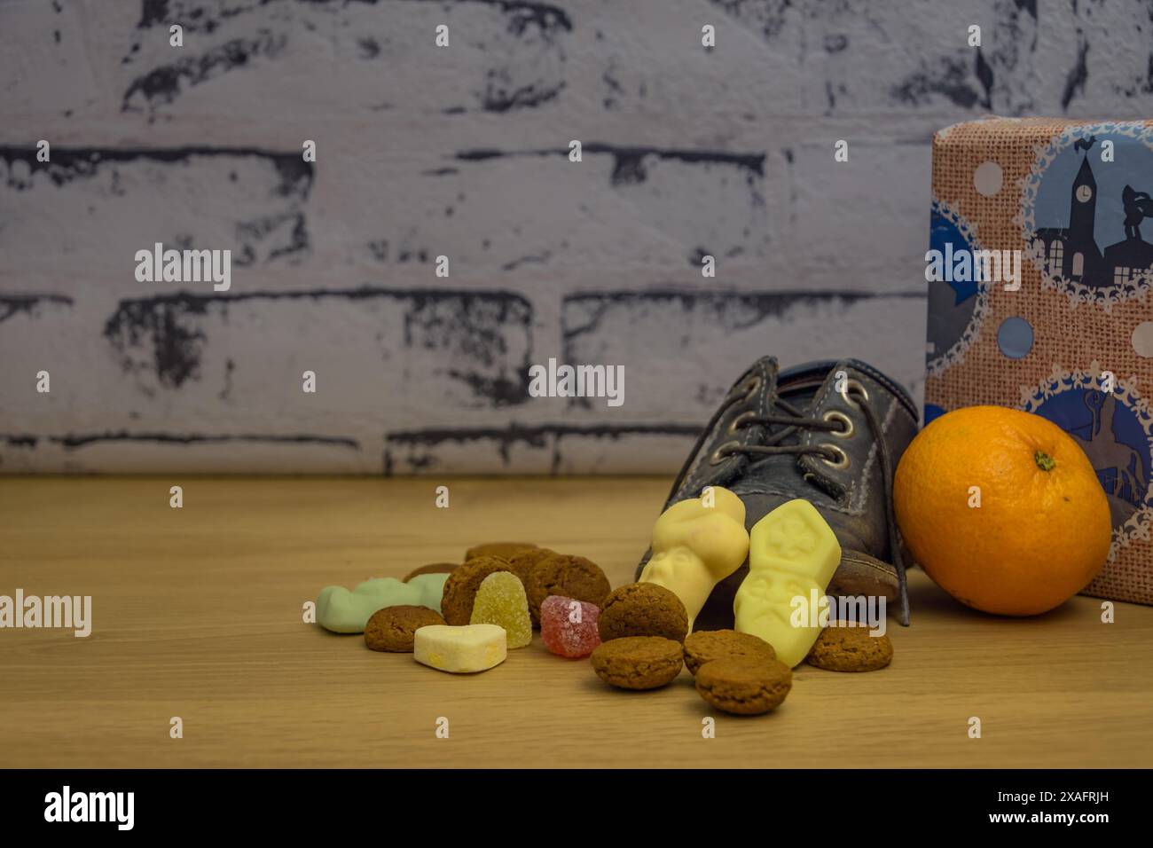 A shoe is placed and rewarded with sweets, a mandarin and a present ...