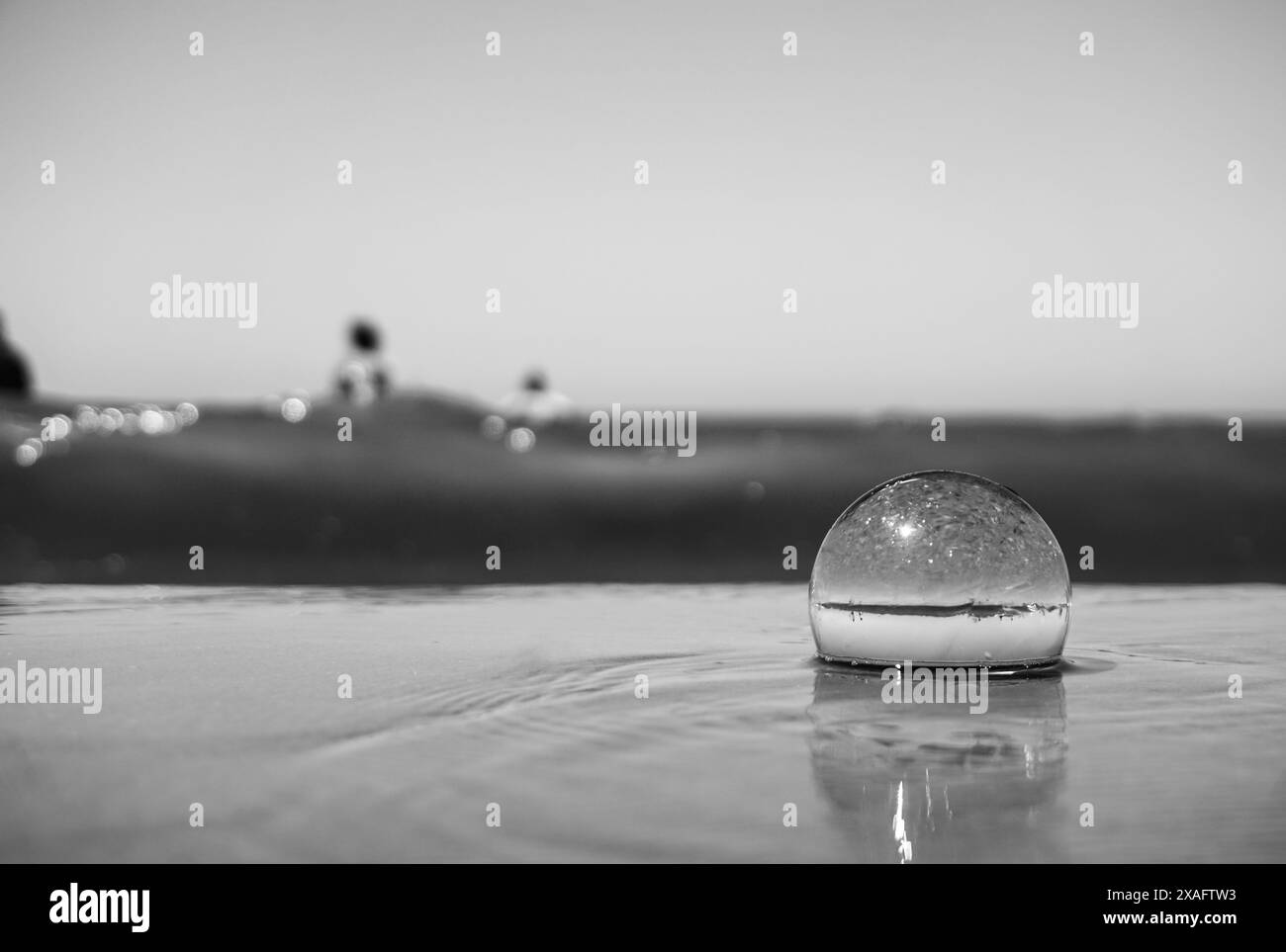 A crystal ball in water Stock Photo - Alamy