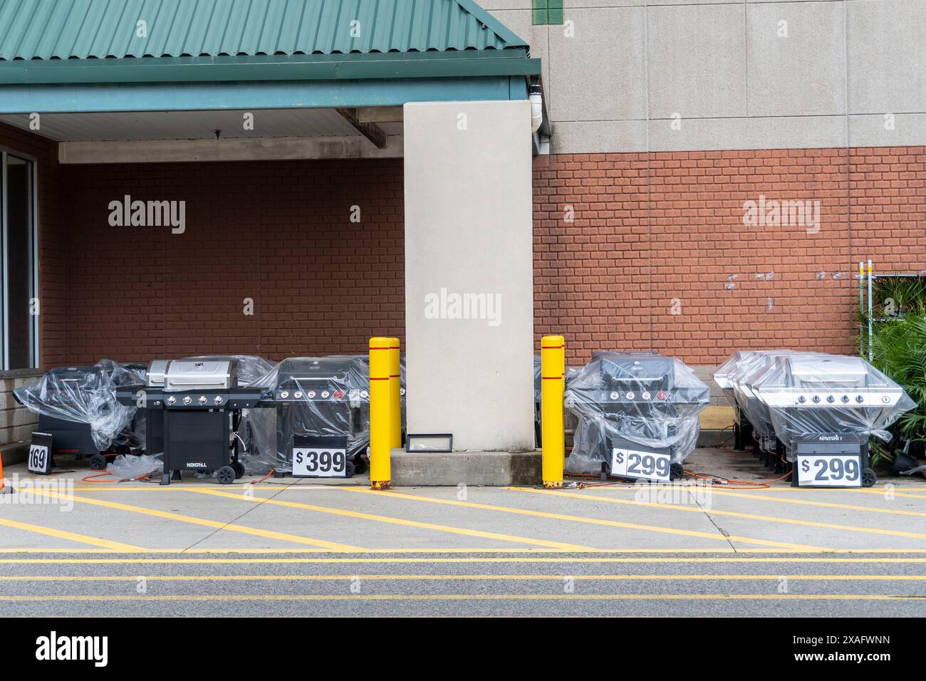 Grills on display in front of a Home Depot store Stock Photo - Alamy