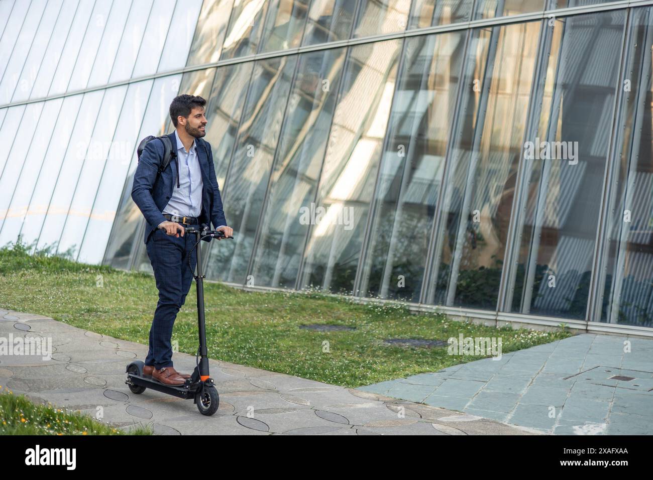 Copyspace Businessman Carrying A Backpack Chooses An Eco Friendly Mode Of Transportation 