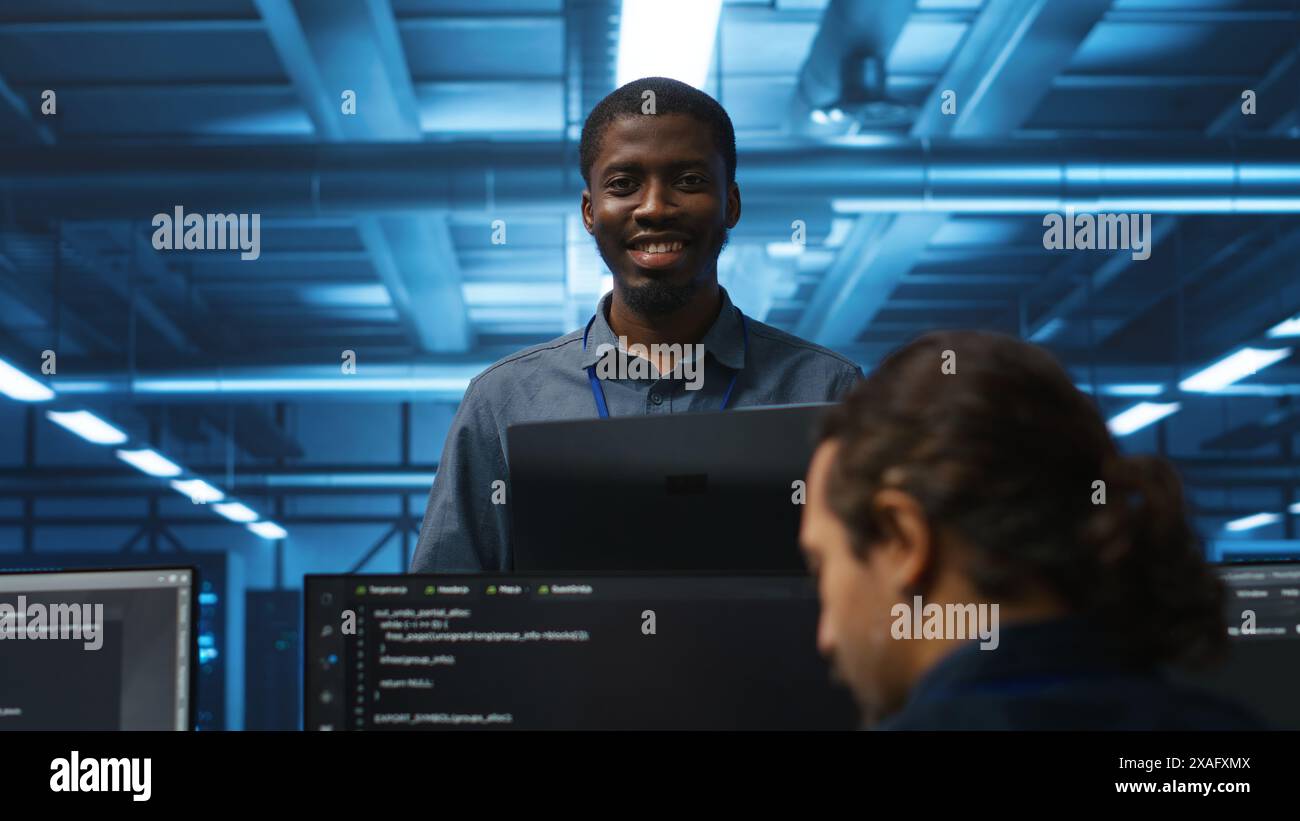 Joyous data center team leader hi-res stock photography and images - Alamy