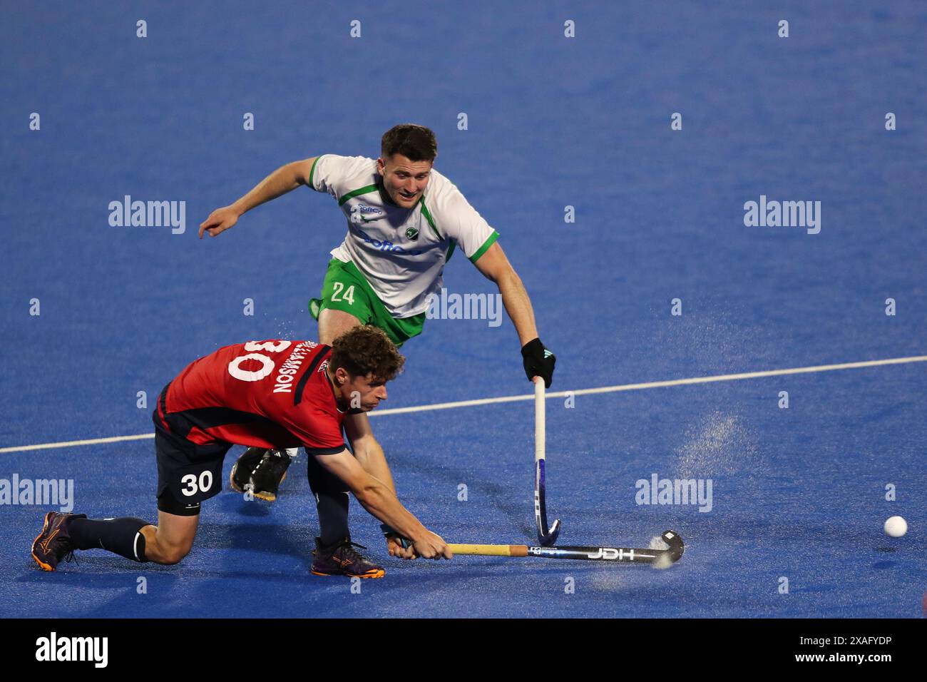 Great Britain's Conor Williamson battles for the ball against Ireland's ...
