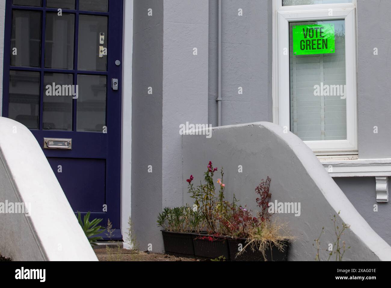 Brighton, UK. 5th June, 2024. A Vote Green poster is displayed in the ...