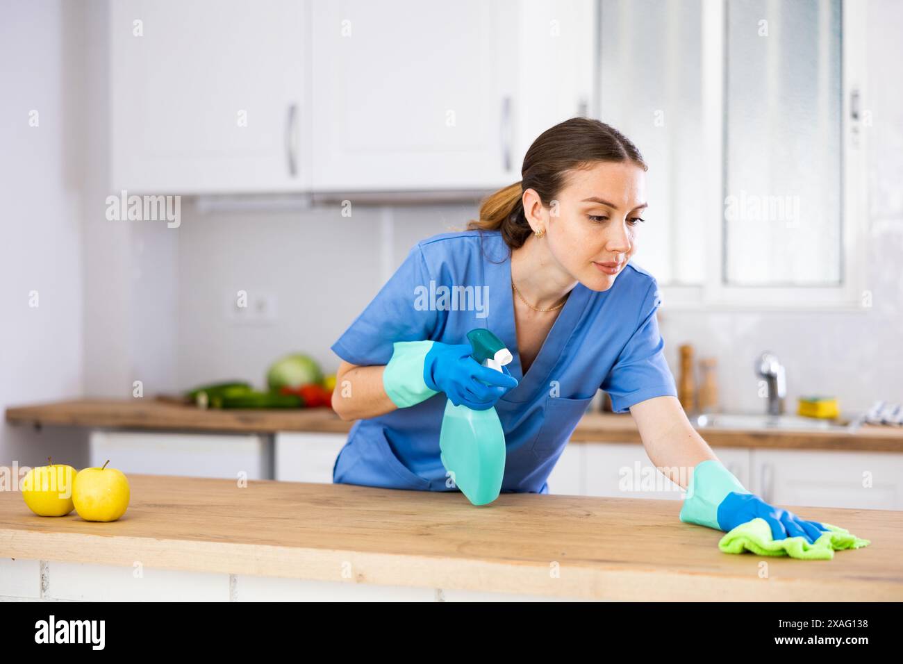 Professional cleaner wipes table hi-res stock photography and images ...