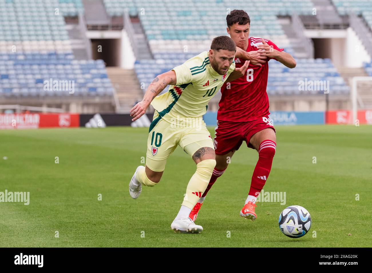 ALGARVE, PORTUGAL - 06 JUNE 2024: Wales' Wes Burns and Gibraltar's ...
