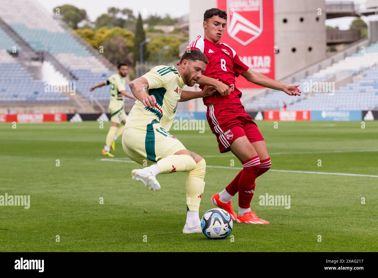 ALGARVE, PORTUGAL - 06 JUNE 2024: Wales' Wes Burns and Gibraltar's ...