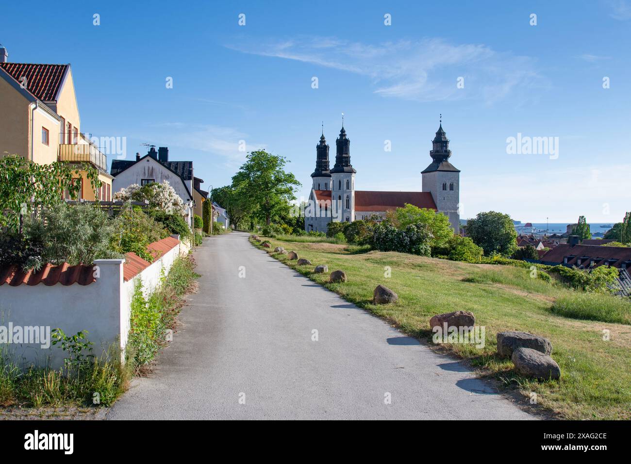 Rooftops and ruins of a medieval church and old houses, Visby, Sweden ...
