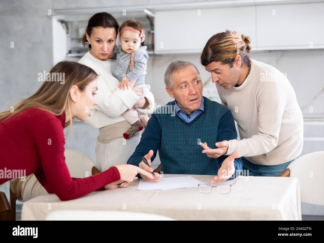 Family members discussing inheritance Stock Photo - Alamy
