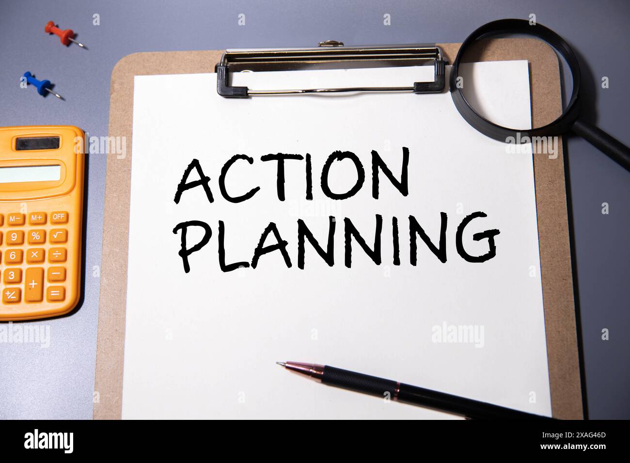 Business Action Plan text on yellow sticker. on a notepad on the ...