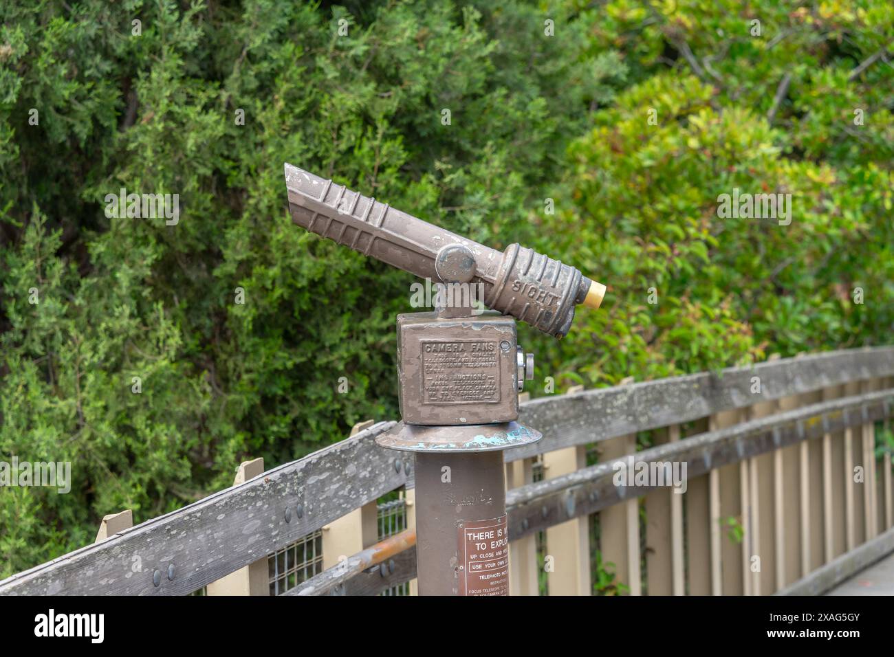 A vintage public coin operated telescope on a observation deck Stock ...