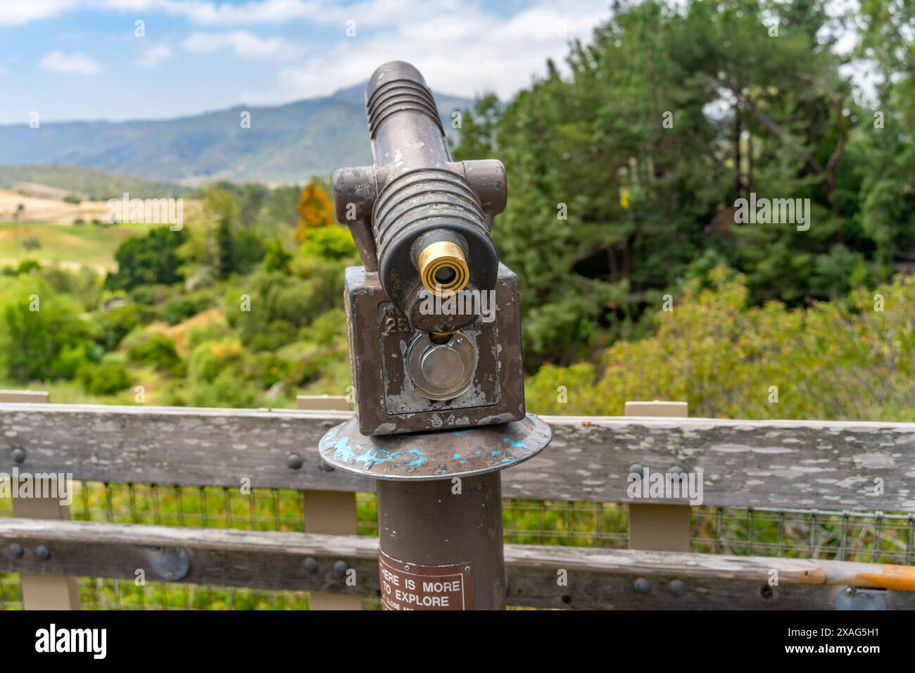 A vintage public coin operated telescope on a observation deck Stock ...
