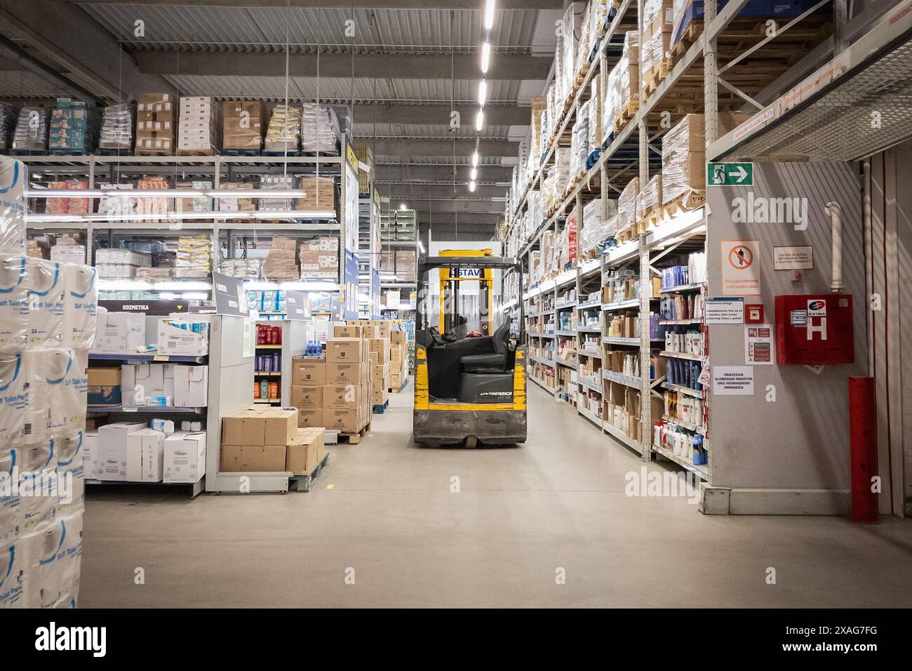 Forklift operates in supermarket hi-res stock photography and images ...