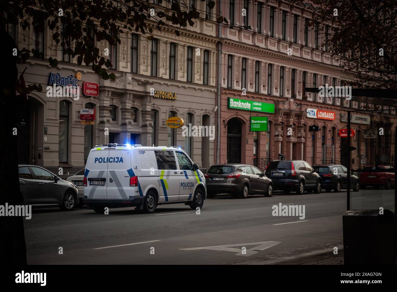 A detailed image of a Latvian police van, highlighting the presence and ...