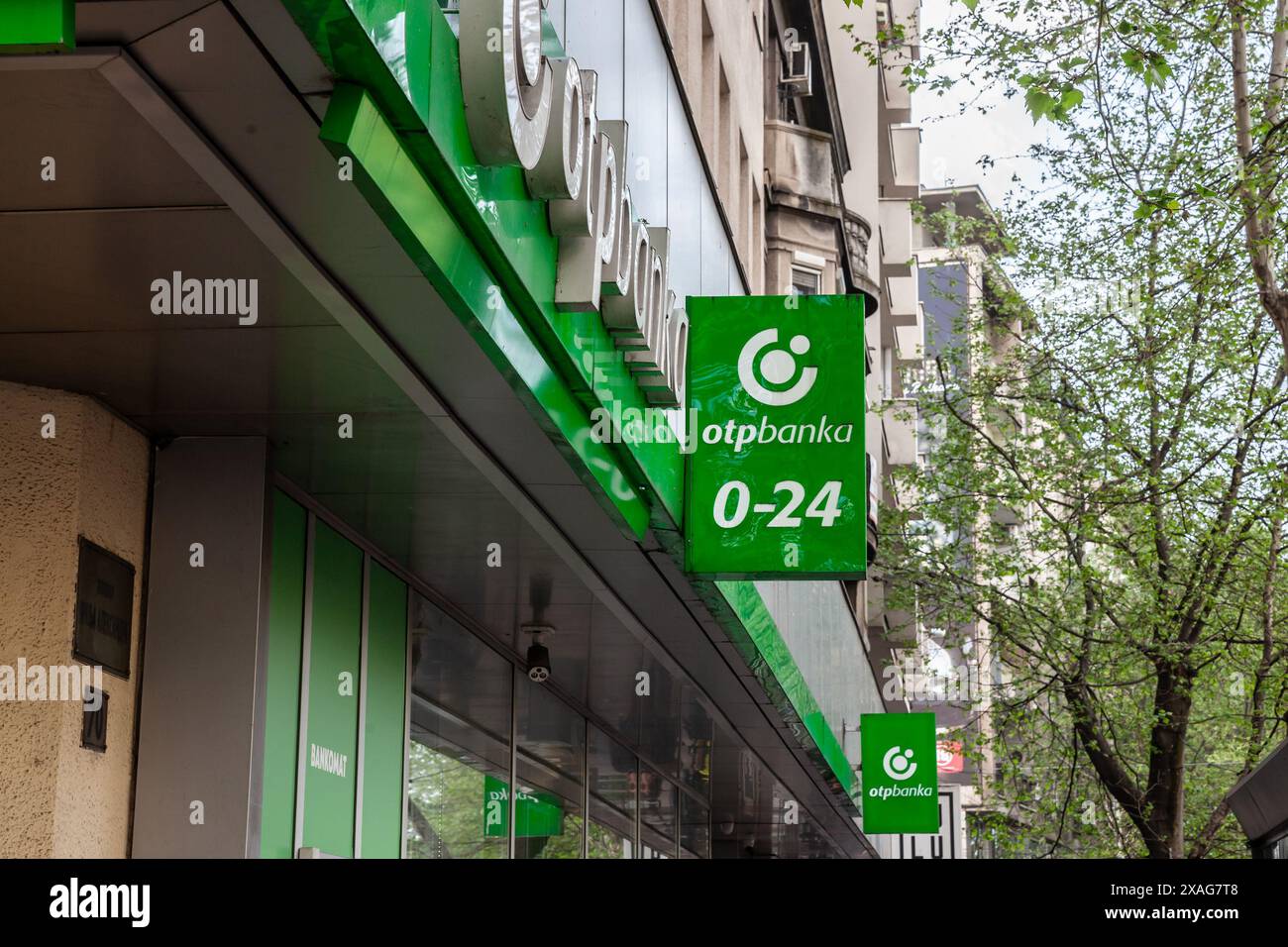 Featured here is the sign of OTP Bank's branch office in Belgrade ...