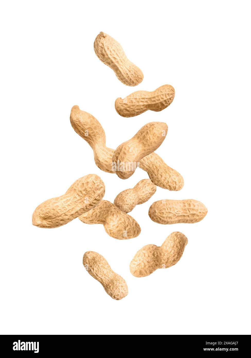 Unpeeled peanuts in air on white background Stock Photo - Alamy