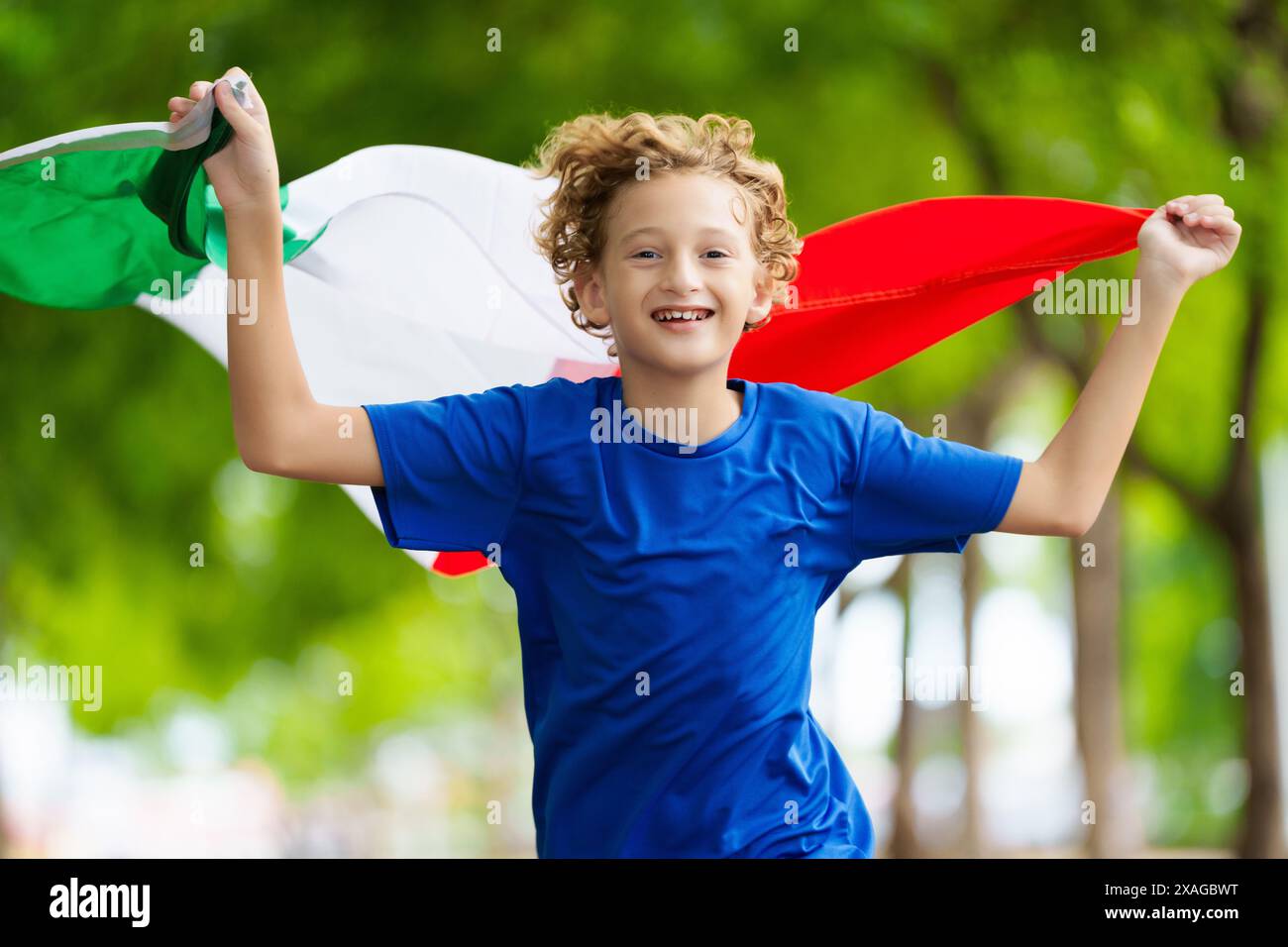 Child running with Italy flag. Italian football supporter. Little ...