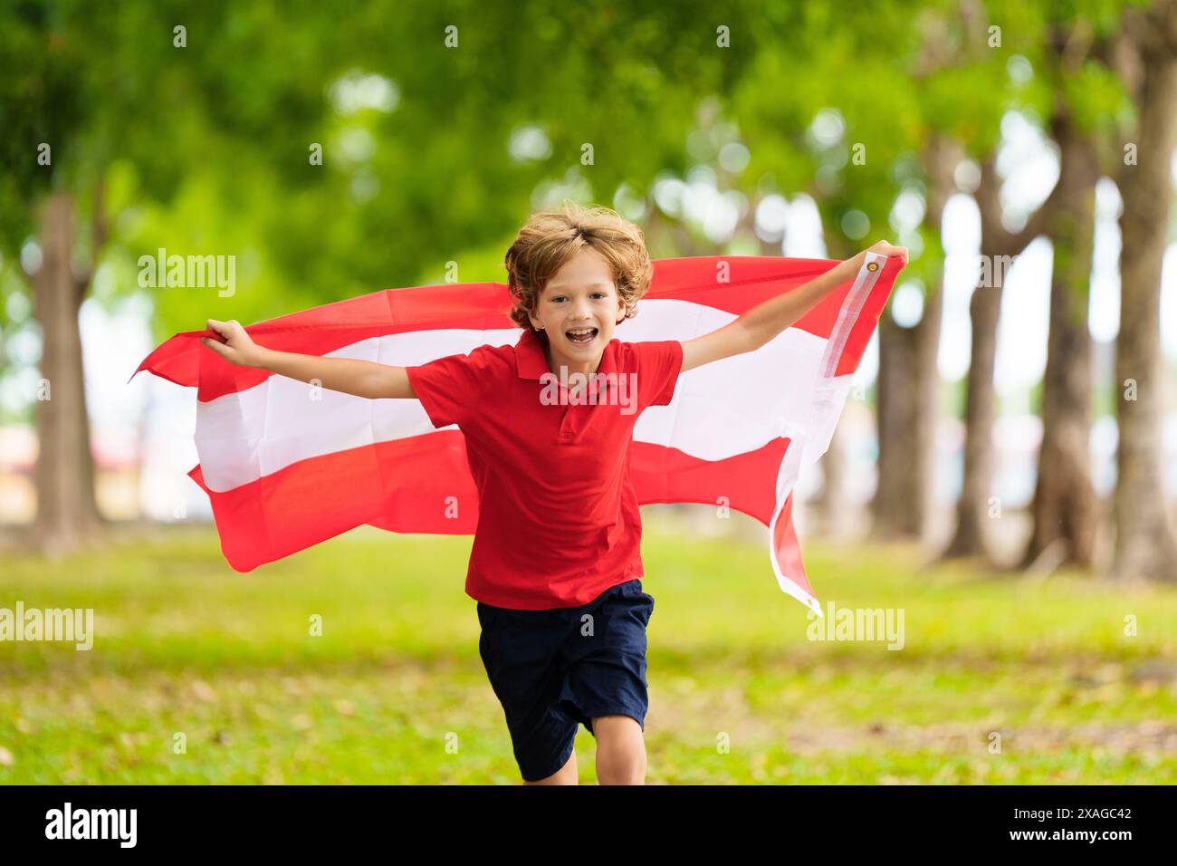 Child running with Austria flag. Little Austrian boy cheering for ...