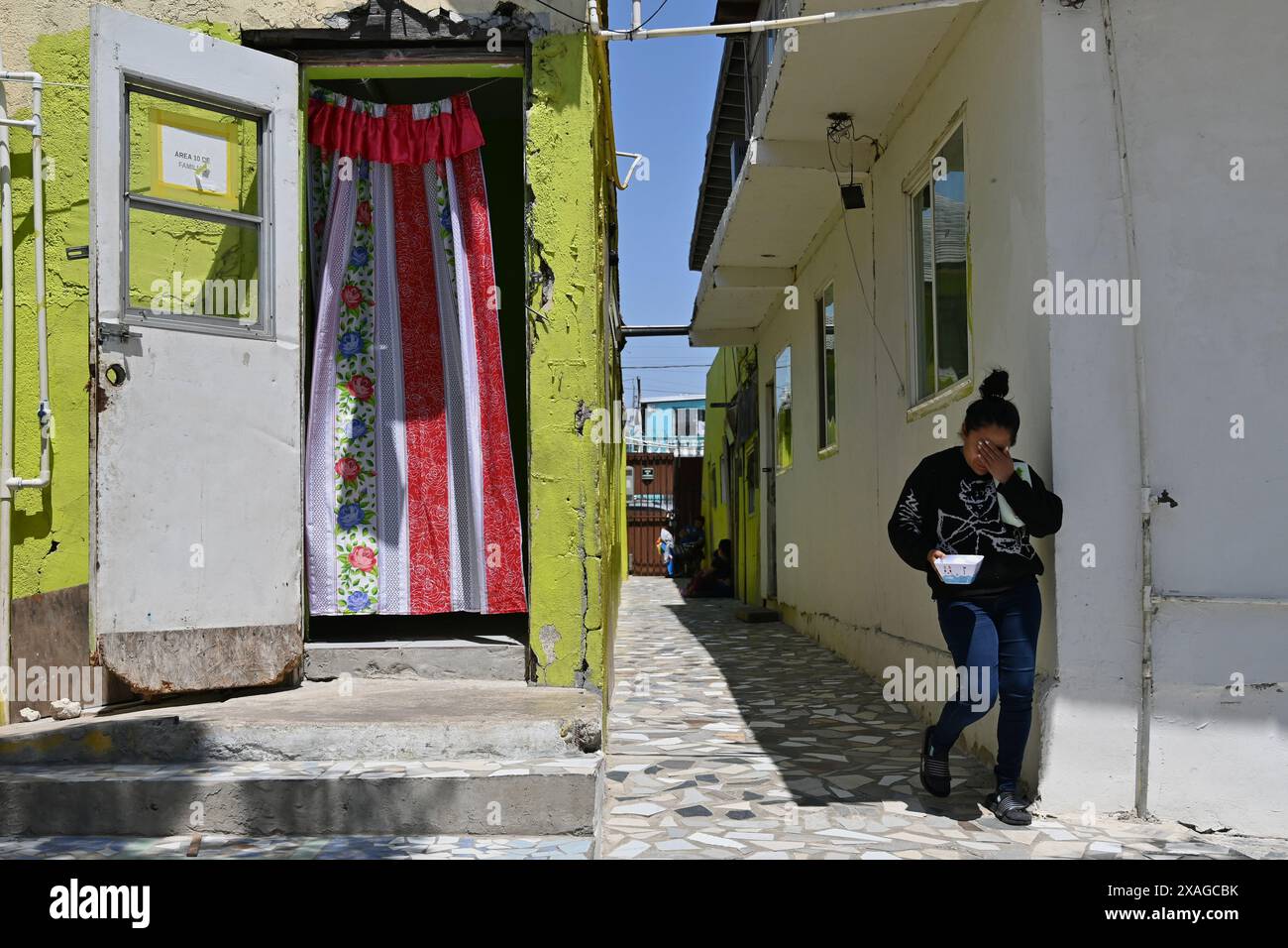 June 6, 2024, Tijuana, Baja California, Mexico: A migrant woman from ...
