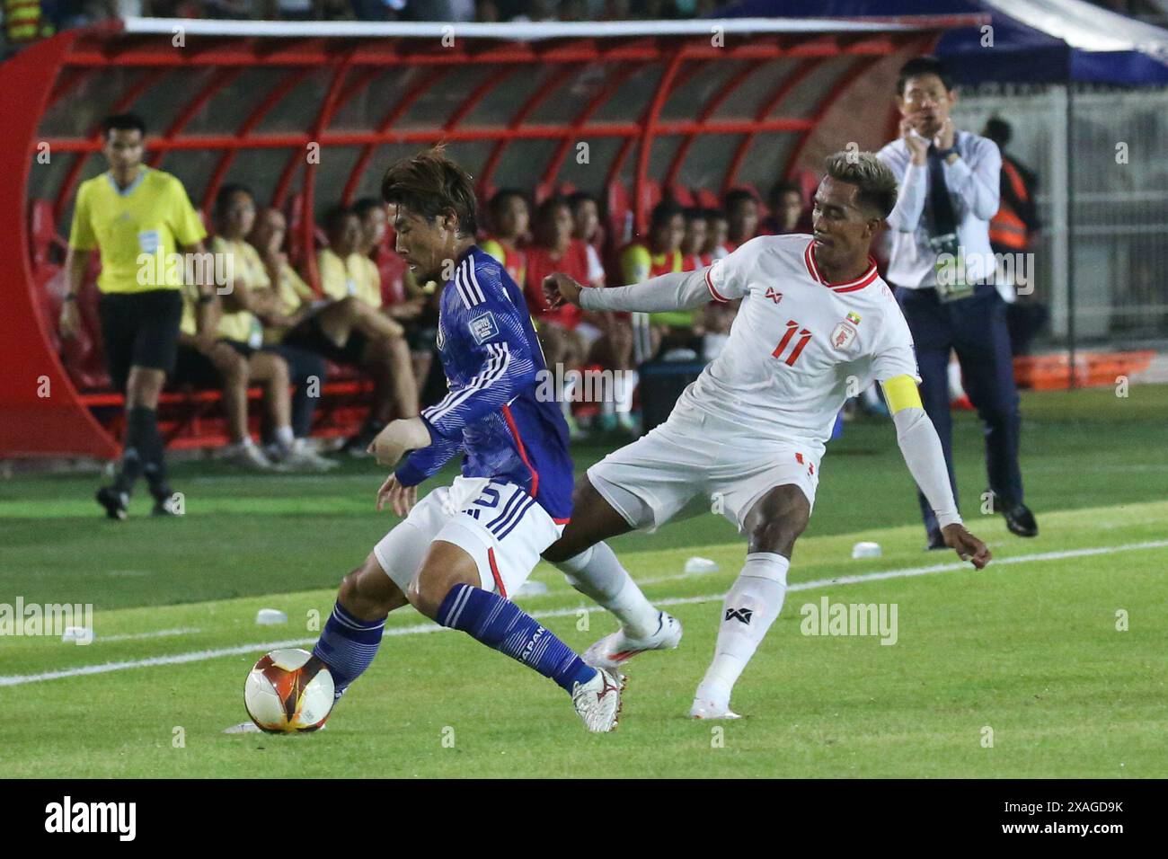 (240607) -- YANGON, June 7, 2024 (Xinhua) -- Morita Hidemasa (L) of ...