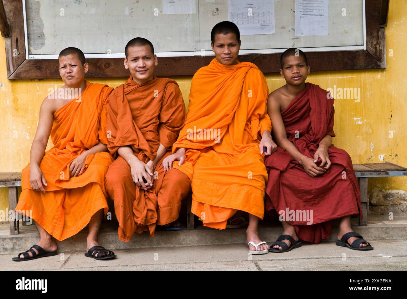 Young Buddhist monks sitting at their monastery in Phnom Penh, Cambodia ...