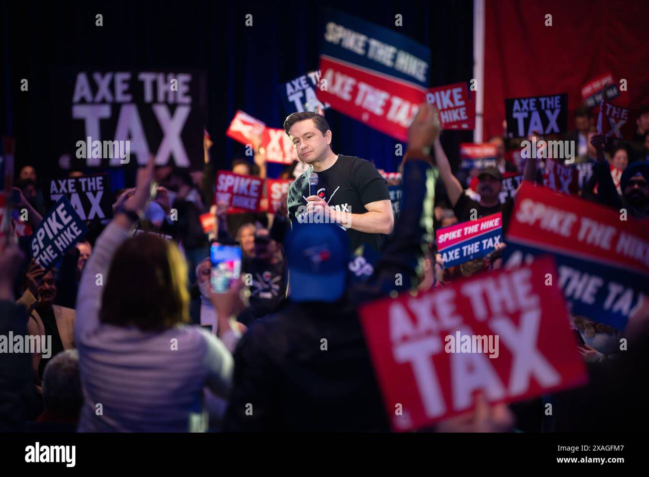 Conservative Party of Canada leader Pierre Poilievre holds an Axe the ...