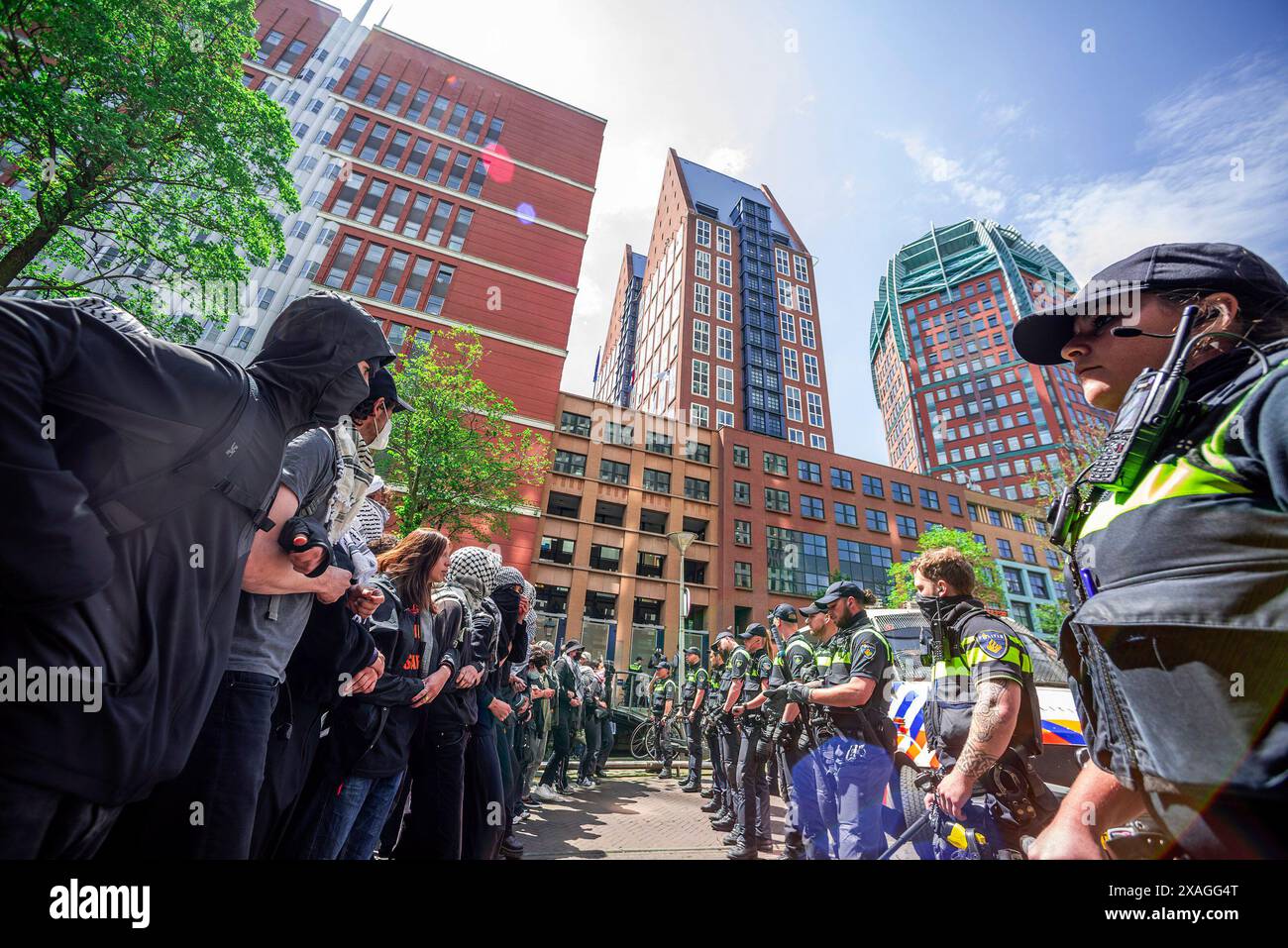 Police officers and demonstrators face-off, during the protest. Police ...