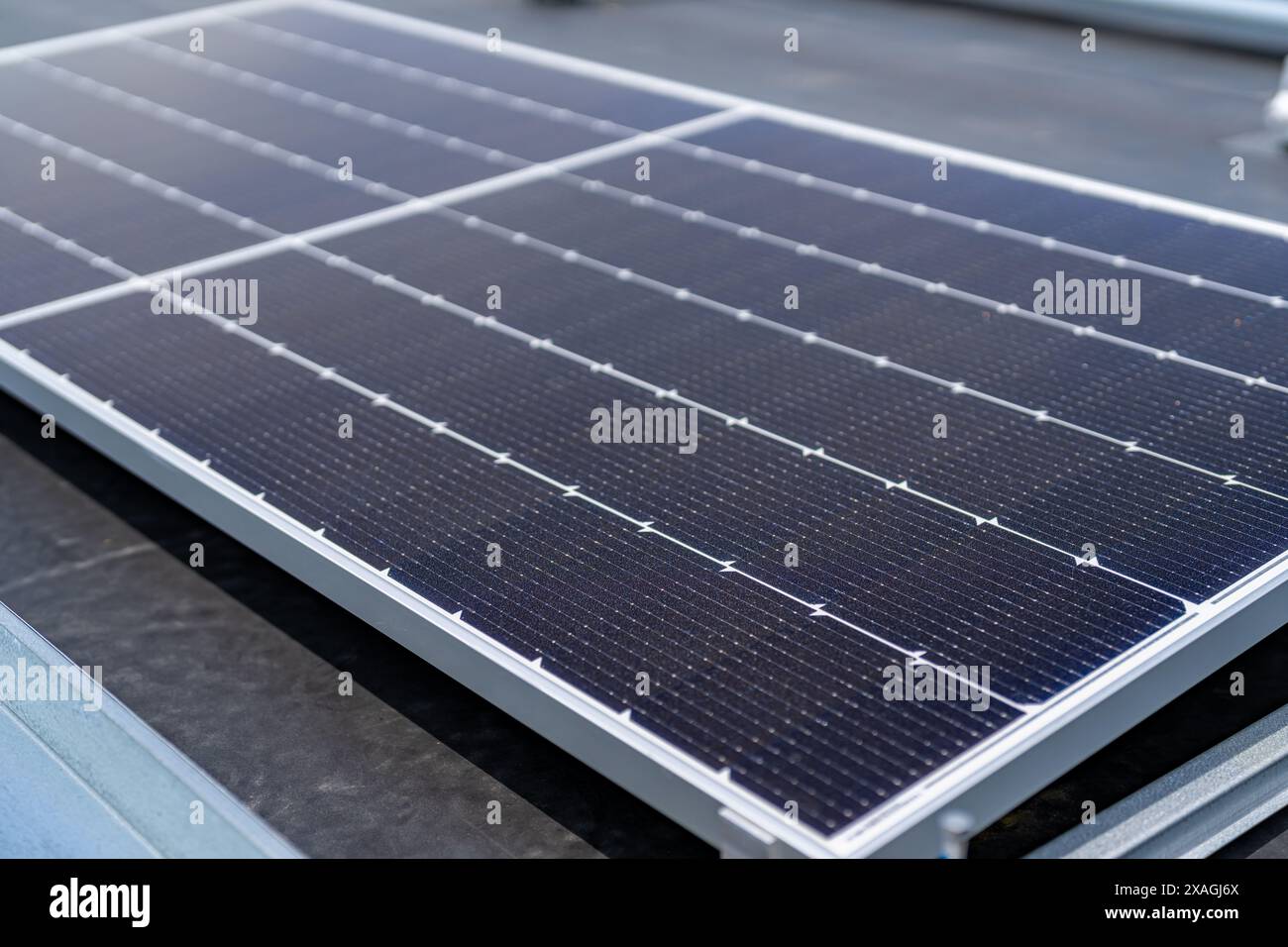 Photo solar panels install on a flat commercial, industrial EPDM roof ...