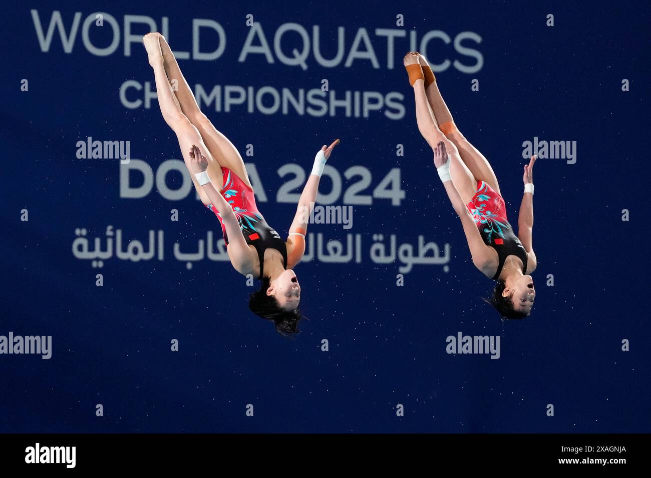 FILE - Chen Yuxi and Quan Hongchan, of China, compete during the women ...