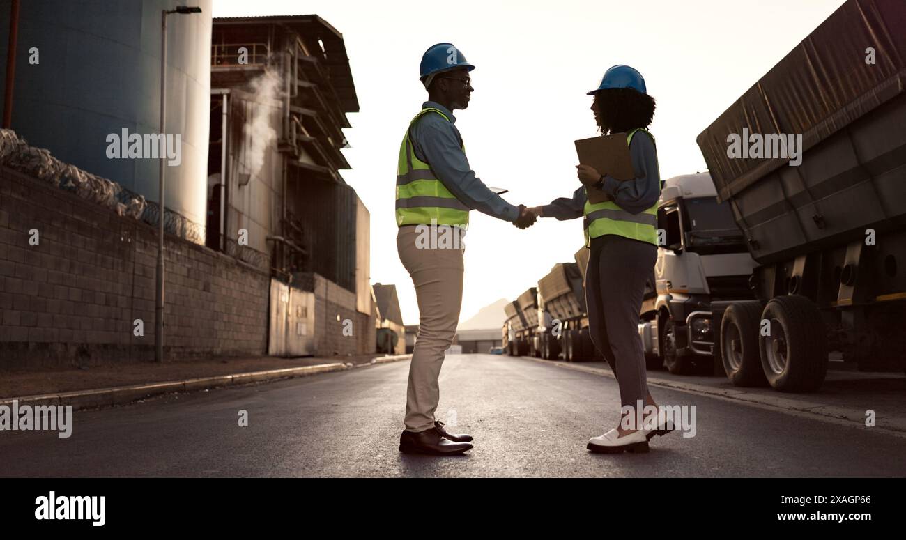 Engineer, handshake and people at construction site for welcome ...