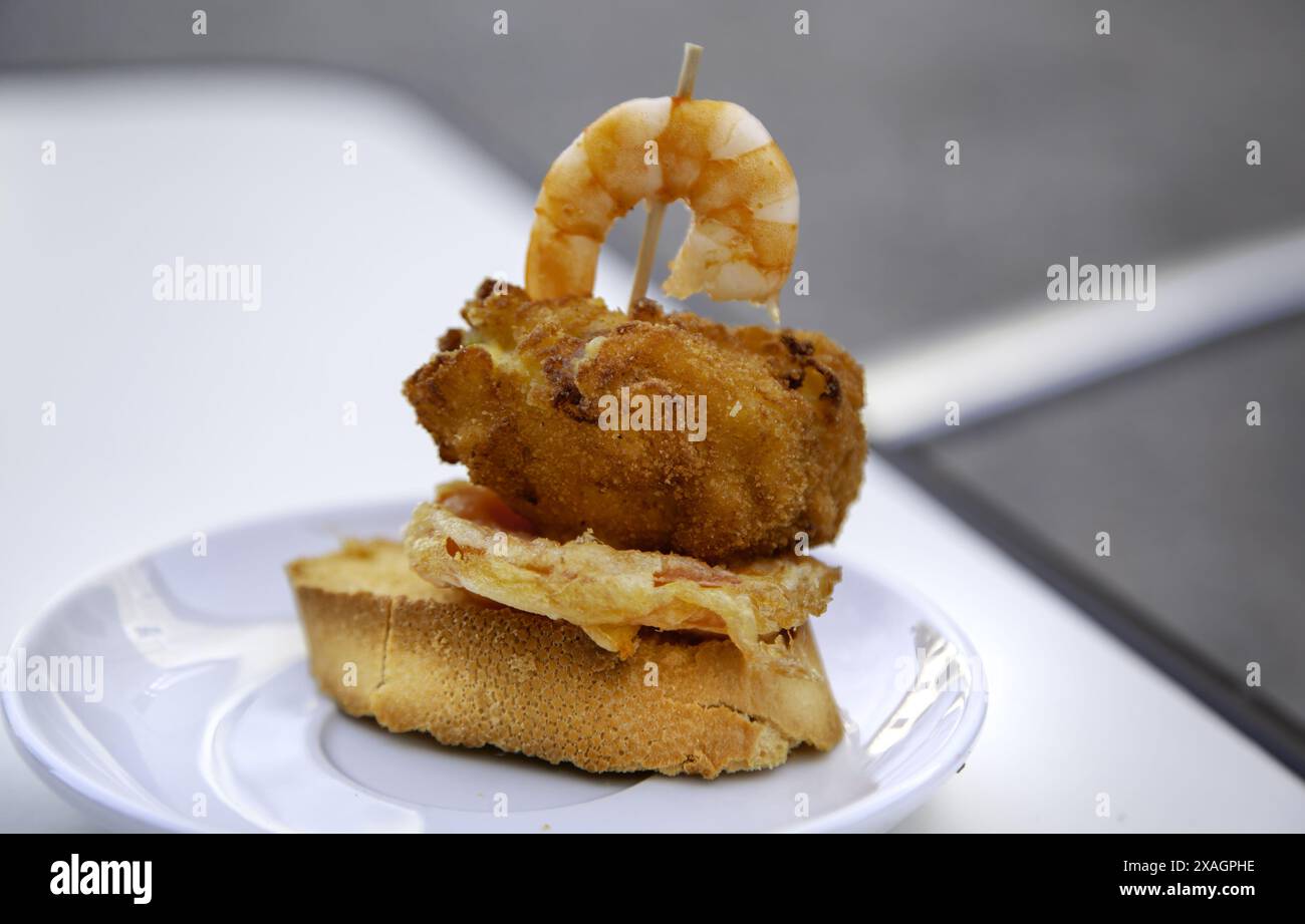 Detail of typical Spanish pinchos, food and fun Stock Photo - Alamy