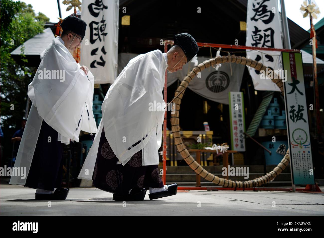 Priests perform a traditional Japanese ritual called "Chinkasai," or a ...
