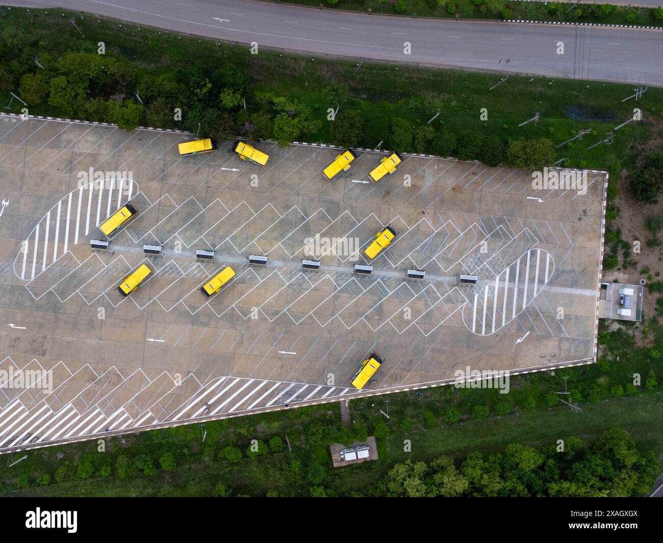 Aerial view of the electric bus charging station. Yellow electric city ...
