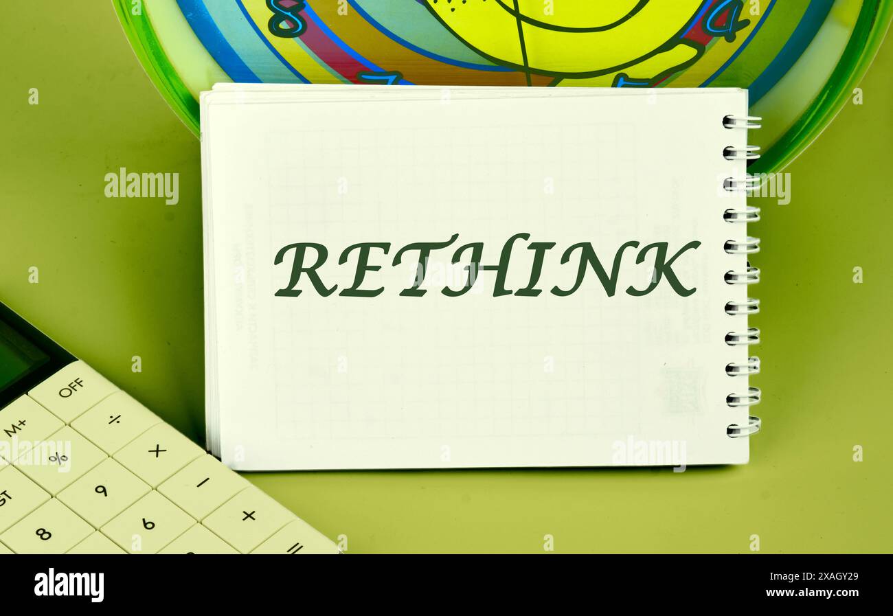 Business, rethinking and rebranding concept. Word Rethink on a notepad ...