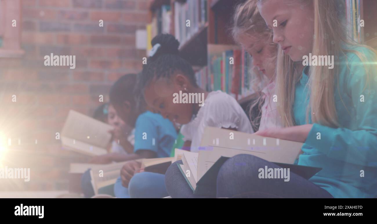 Image of light trail over diverse schoolchildren reading books in ...
