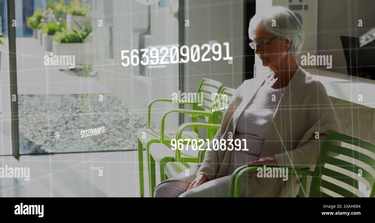 Image of numbers and data processing over senior caucasian woman in ...