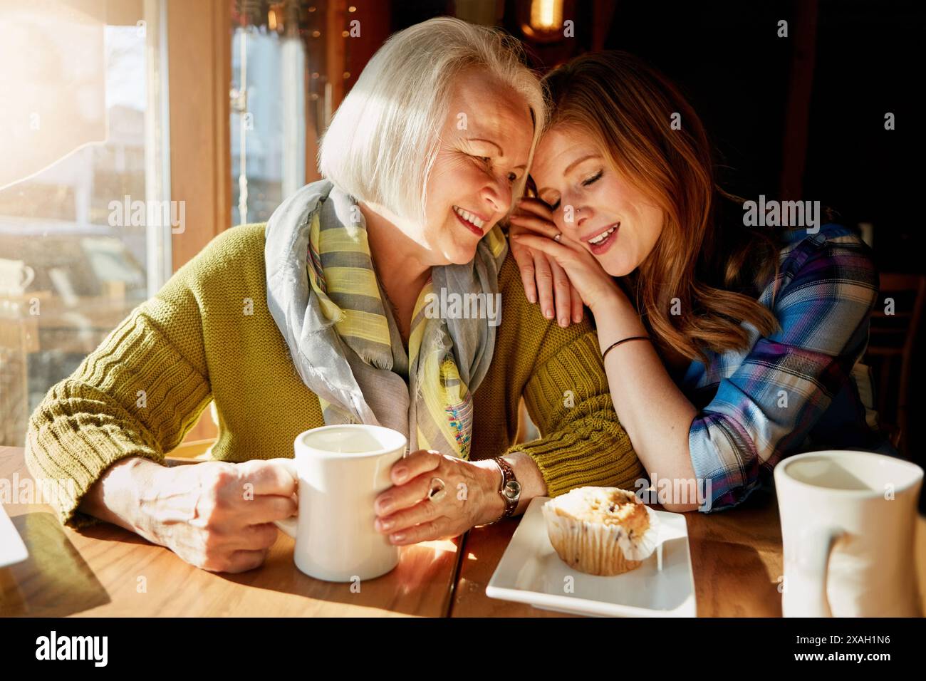 Woman, cafe and senior hug with mother for bonding travel or morning ...