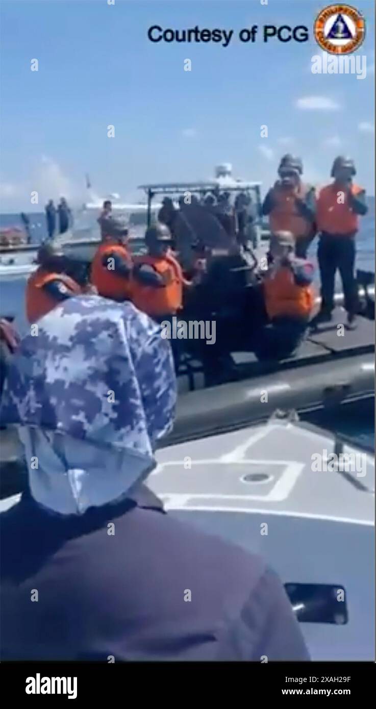 In this image taken from a video released by Philippine Coast Guard, a ...