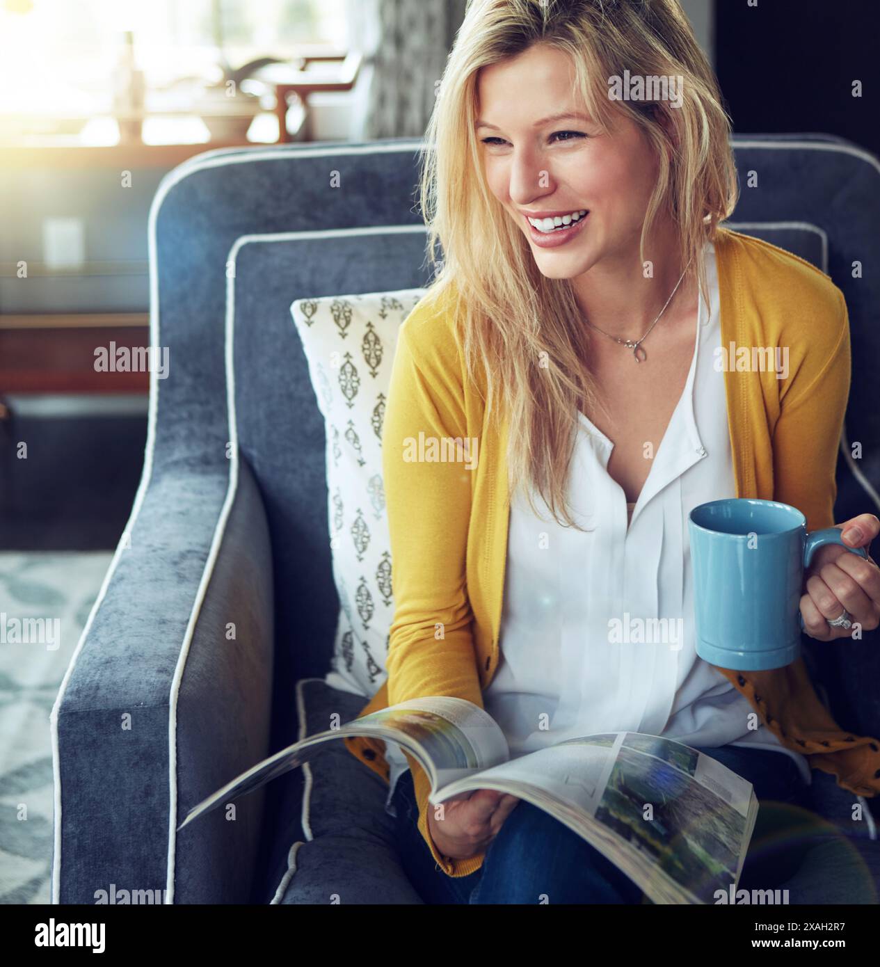 Happy woman, magazine and coffee break in thinking, relax or reading as ...