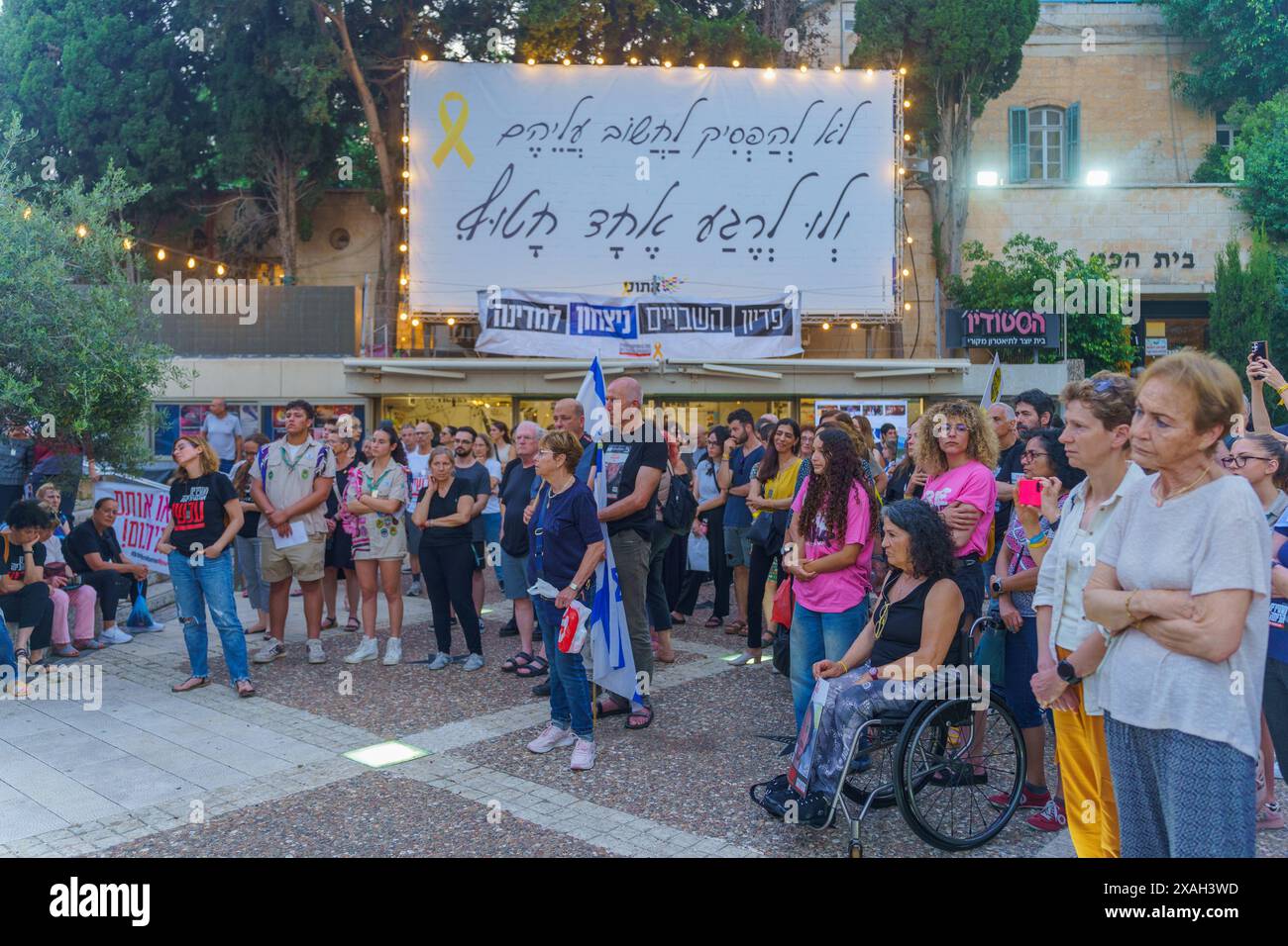 Haifa, Israel - June 06, 2024: Crowd of people with various signs and ...