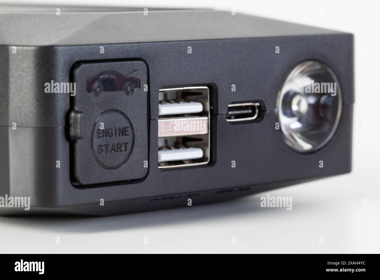 Power bank for starting a car engine with a flashlight. USB connectors ...